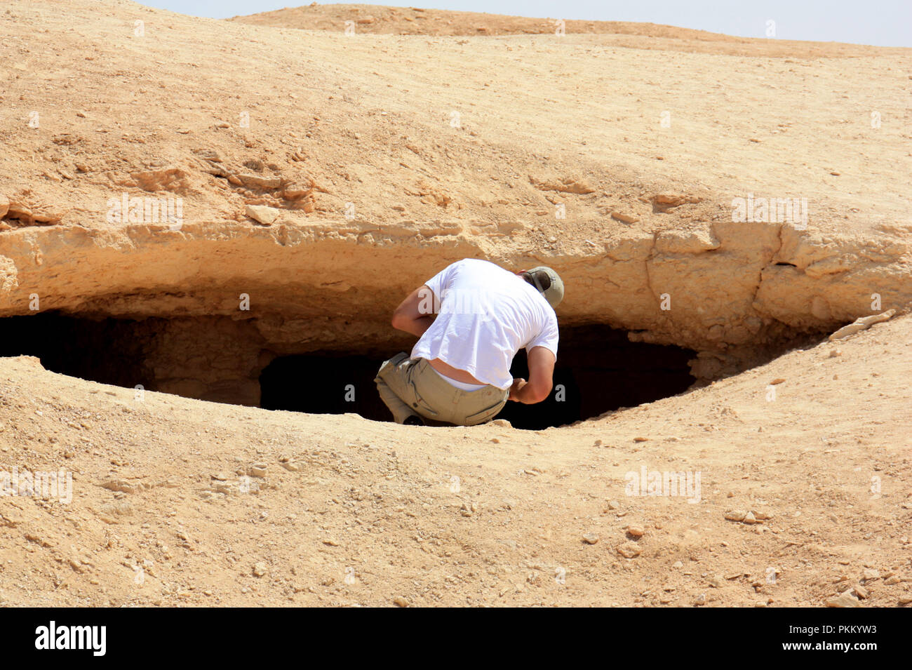 Western Tourist exploring a robbed Tomb at the Mountain of the Dead in ...