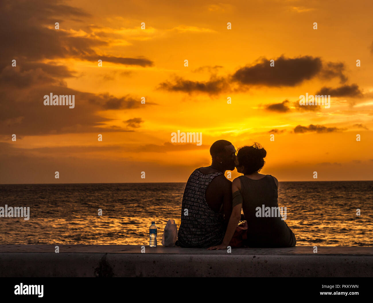 Romantic boy girl kissing in hi-res stock photography and images - Alamy