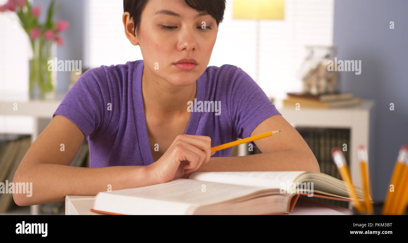 Chinese woman student studying for final exams Stock Photo - Alamy