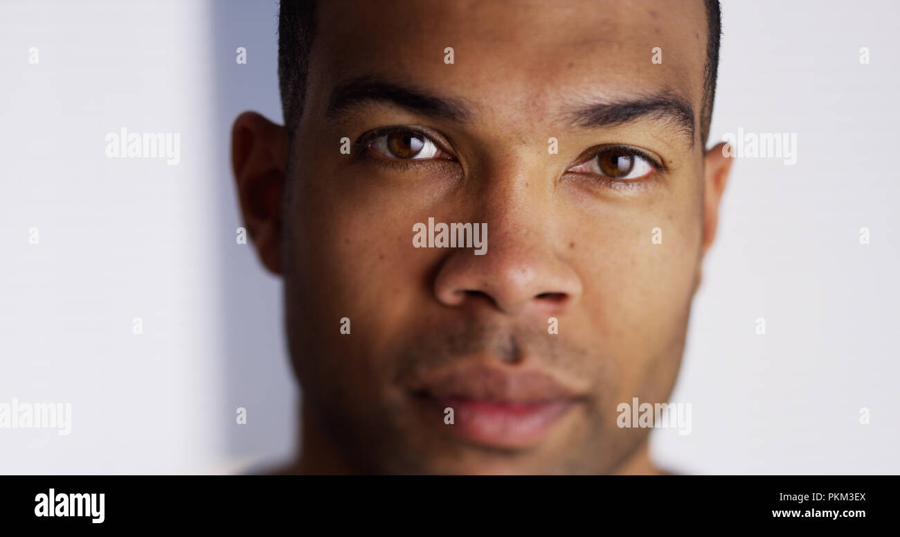 Black man looking at camera Stock Photo - Alamy