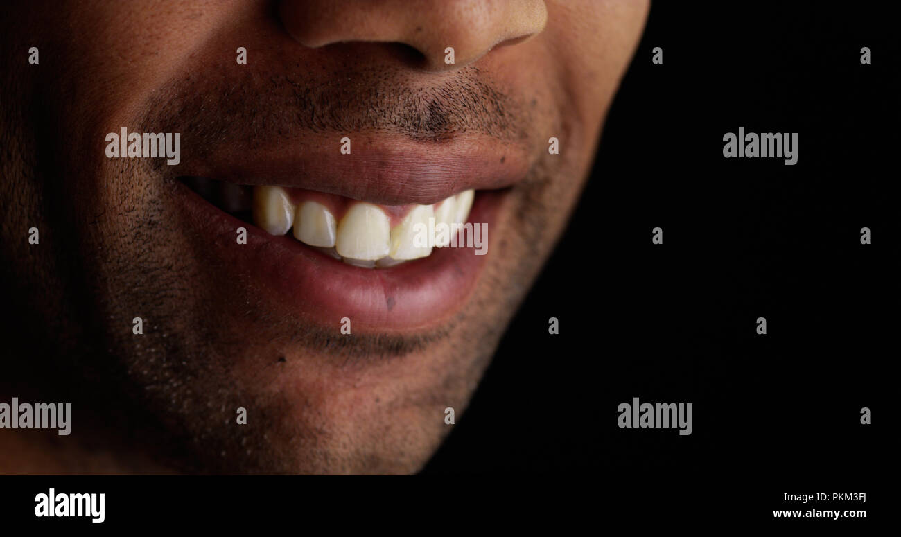 Close up on black male lips Stock Photo - Alamy