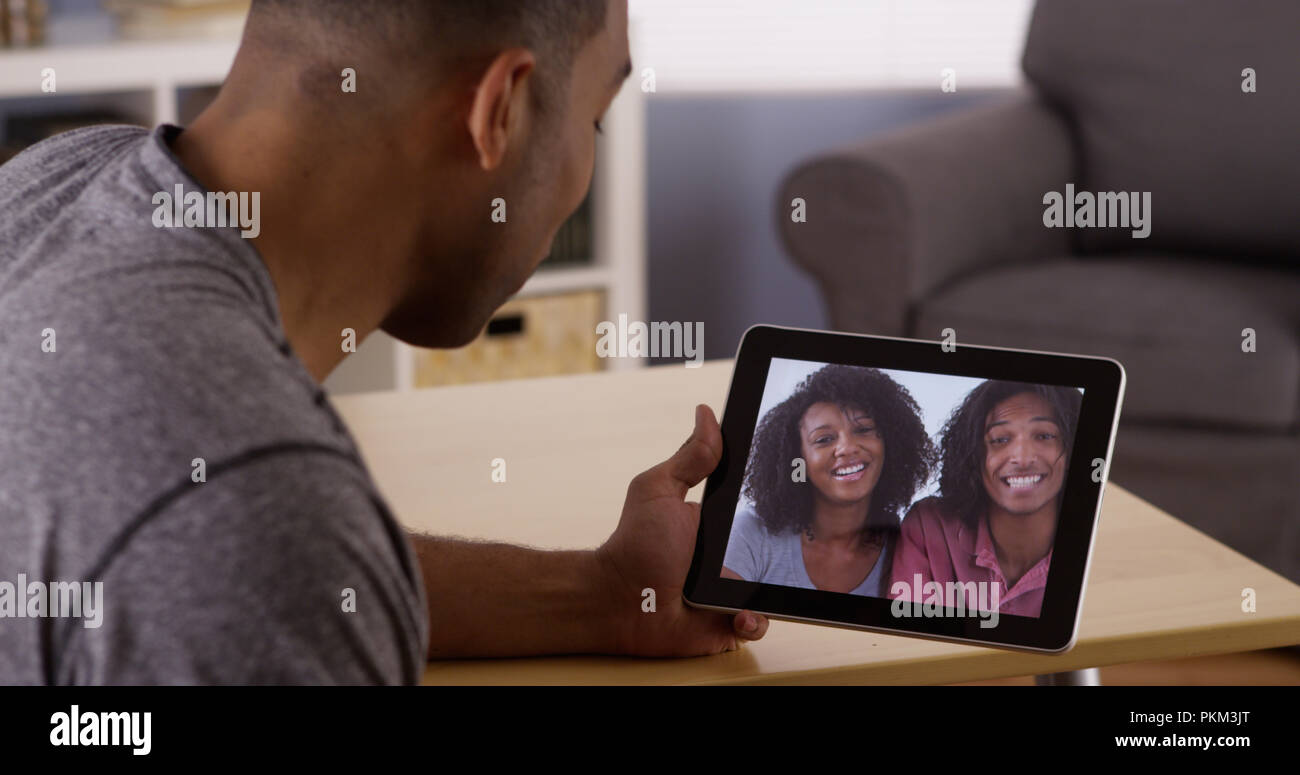 Cheerful people video chatting friends hi-res stock photography and ...