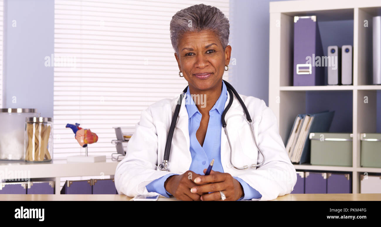 African american nurse listening camera hi-res stock photography and ...