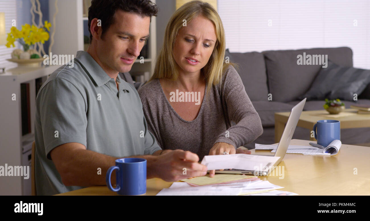Couple managing their bills Stock Photo - Alamy