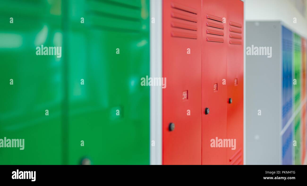 Colorful school metal lockers in a row in school hall Stock Photo - Alamy