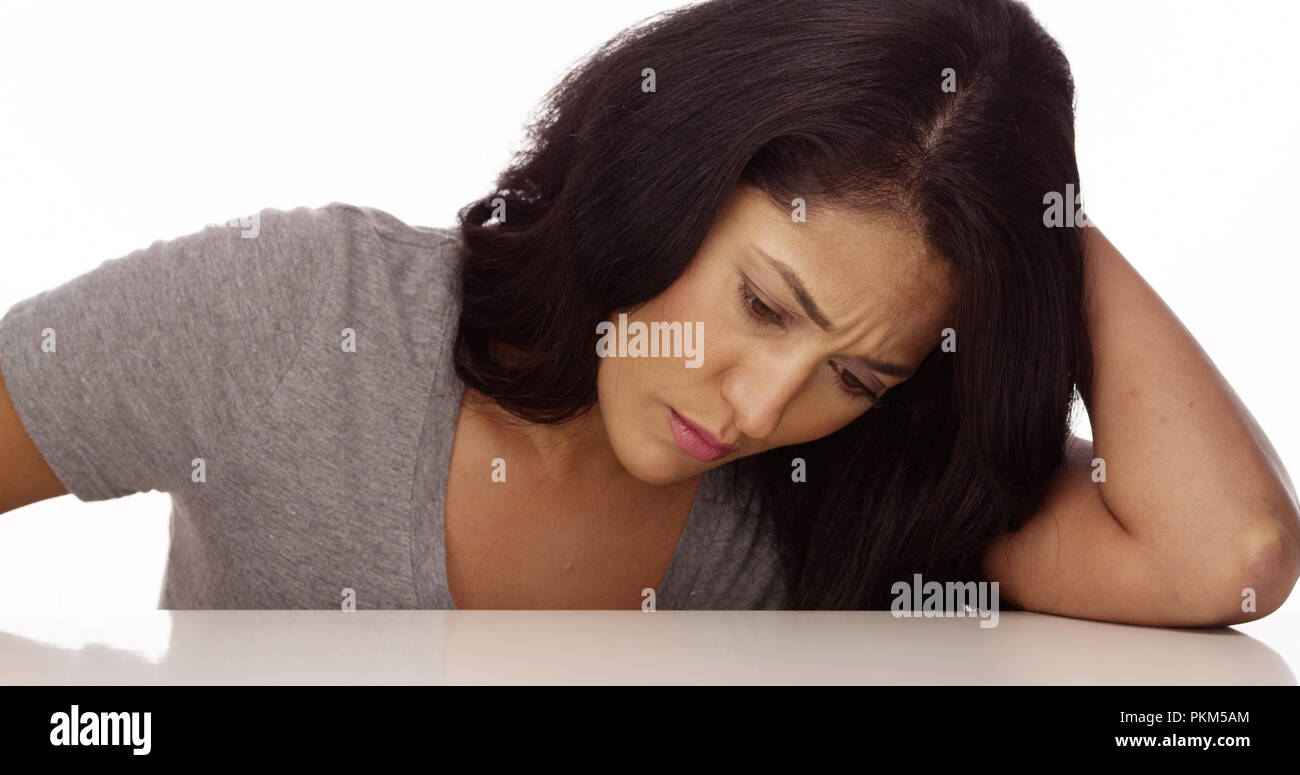 Mexican woman feeling sad Stock Photo - Alamy