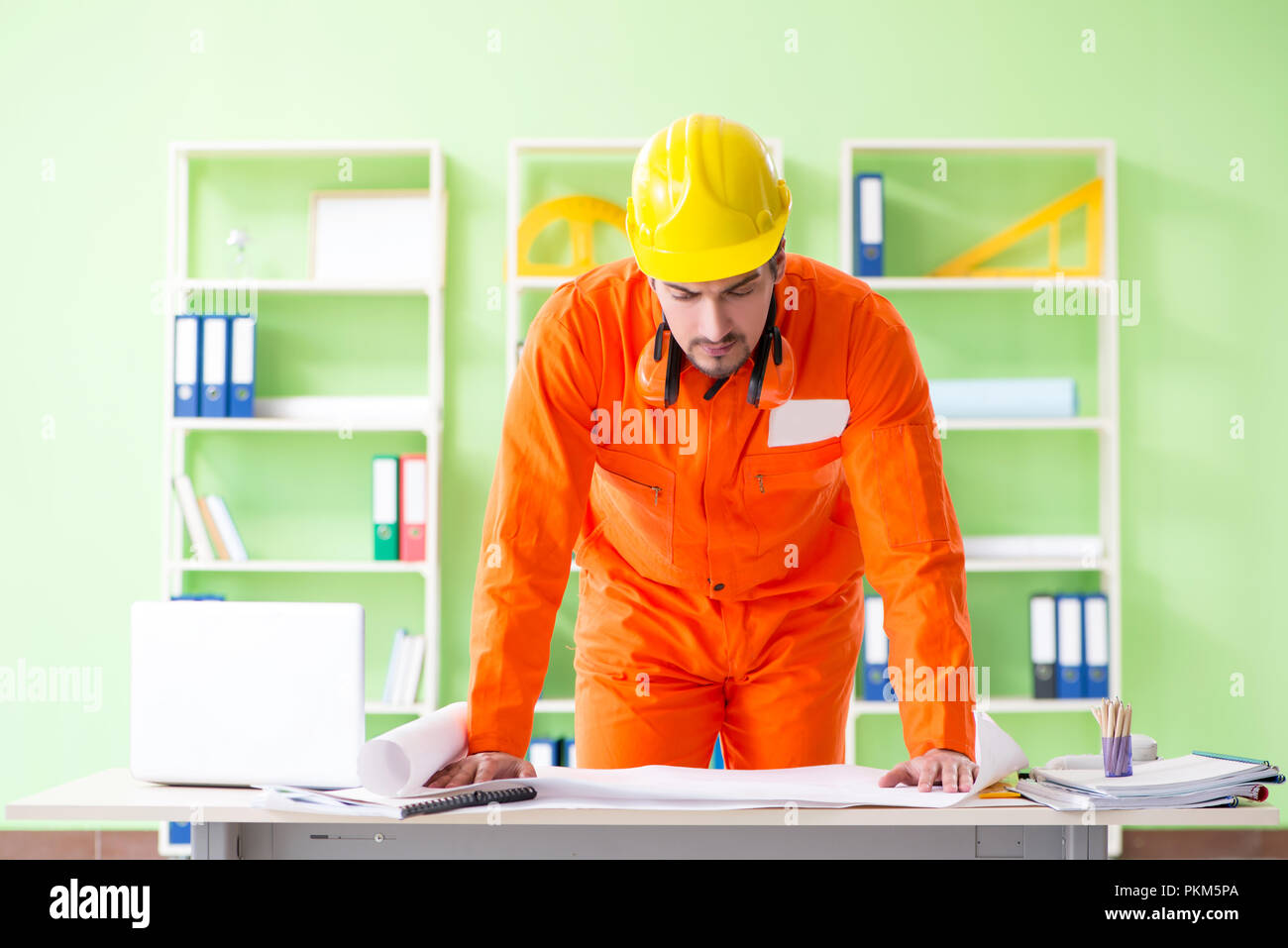 Construction supervisor planning new project in office Stock Photo - Alamy