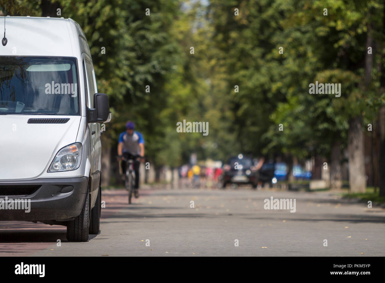 White passenger medium size commercial German luxury minibus van parked ...