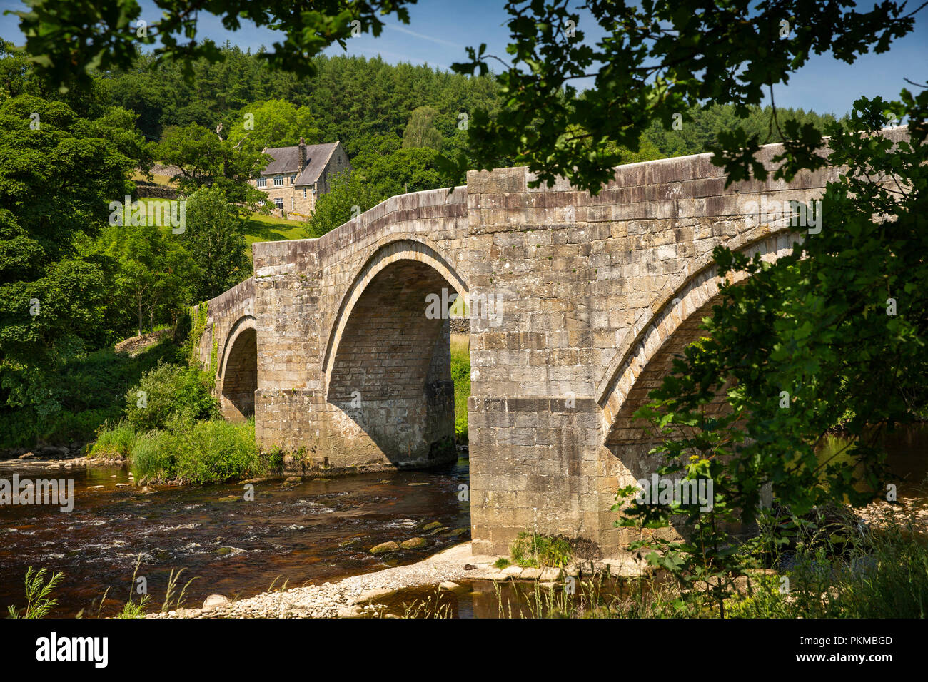 UK, Yorkshire, Wharfedale, Barden Bridge over River Wharfe in mid ...