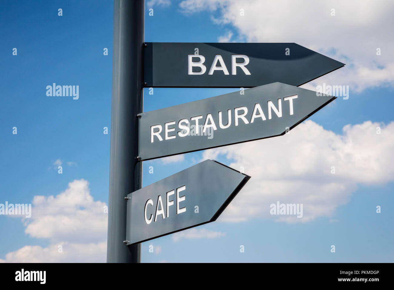 Arrow shaped directional street signs Stock Photo - Alamy