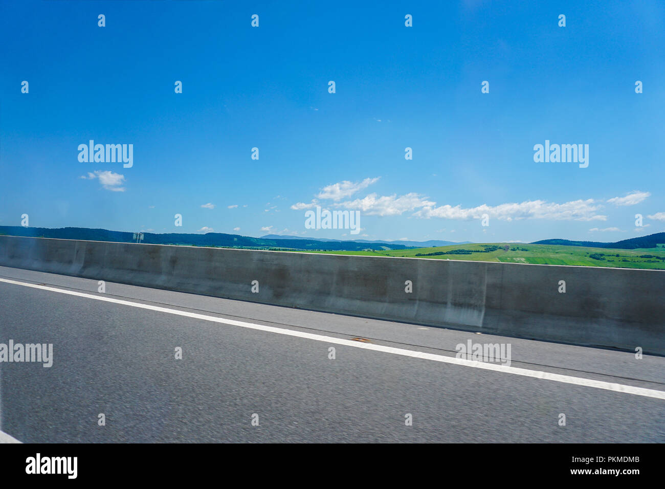 European roads with barrier fencing and blue sky background Stock Photo ...