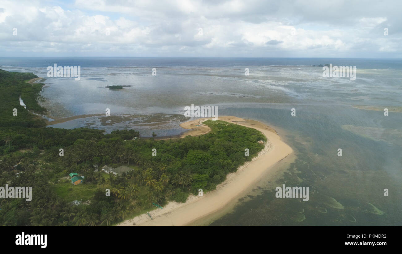 Aerial view of beautiful tropical beach with turquoise water in blue ...