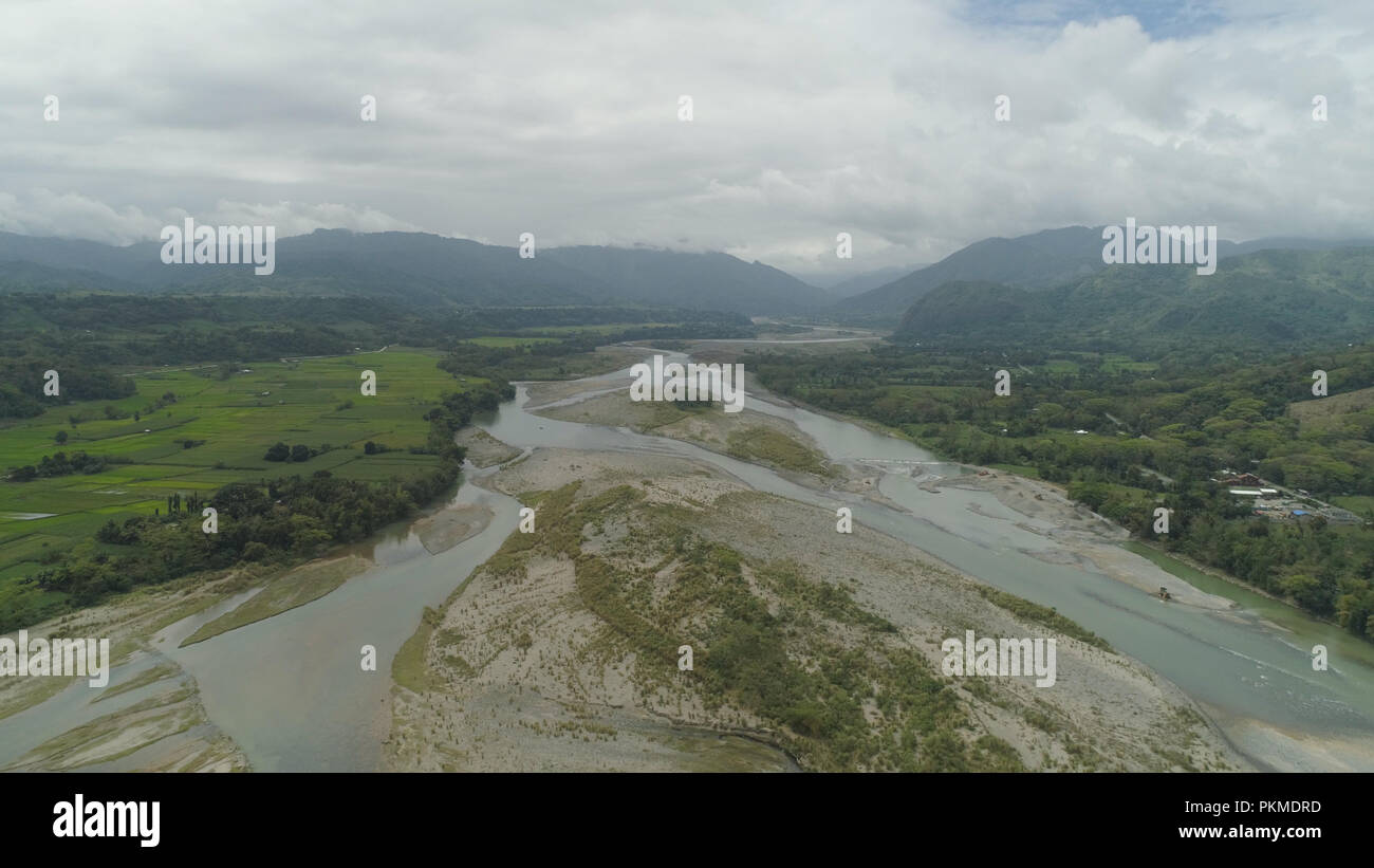 Mountain valley with river, farmland in the Philippines, Luzon. Aerial ...