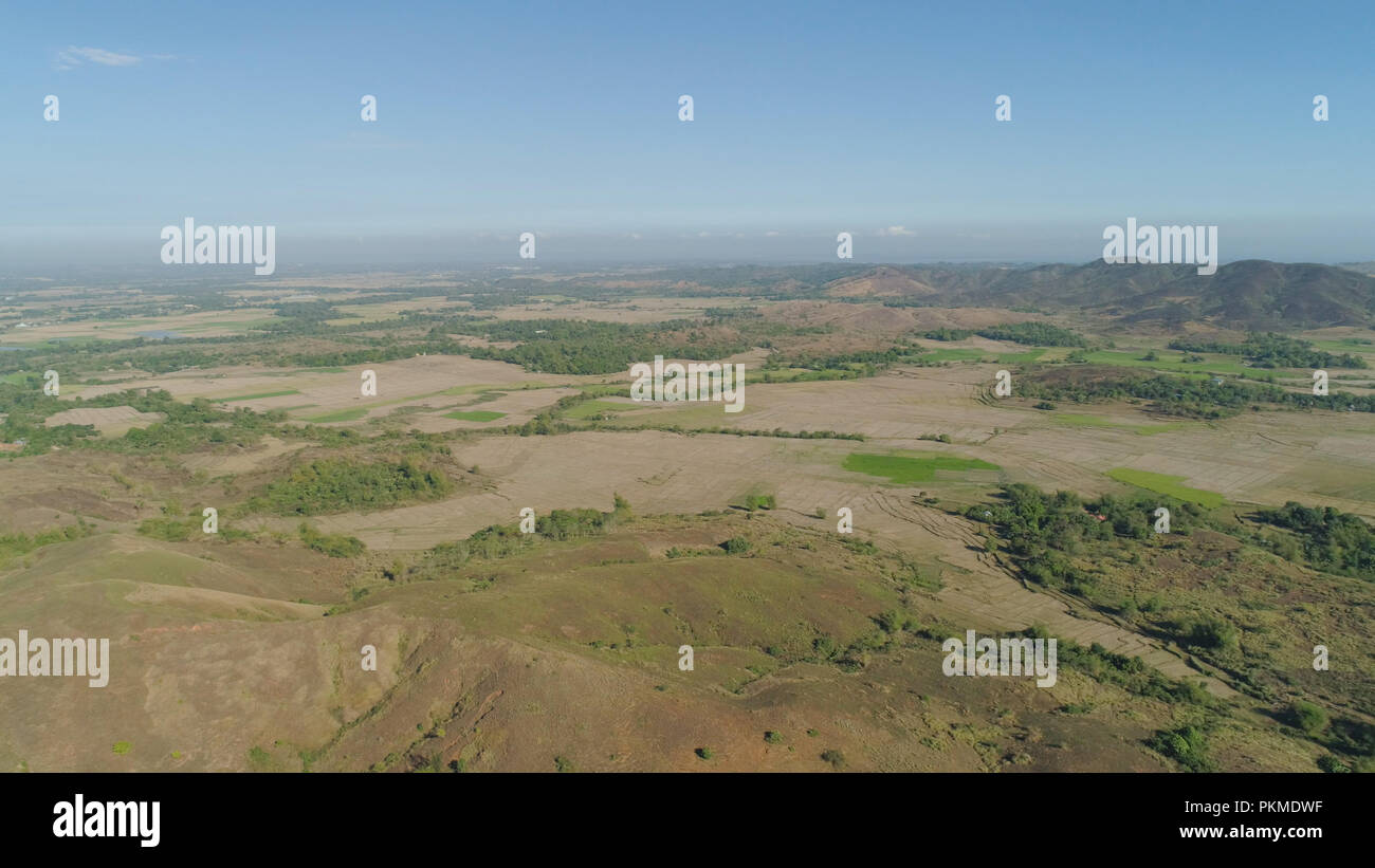 Mountain valley with village, farmland in the Philippines, Luzon ...