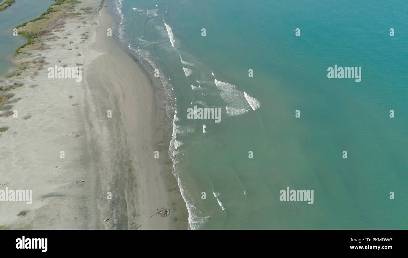 Aerial view of sandy beach Lingayen with azure water on the island ...