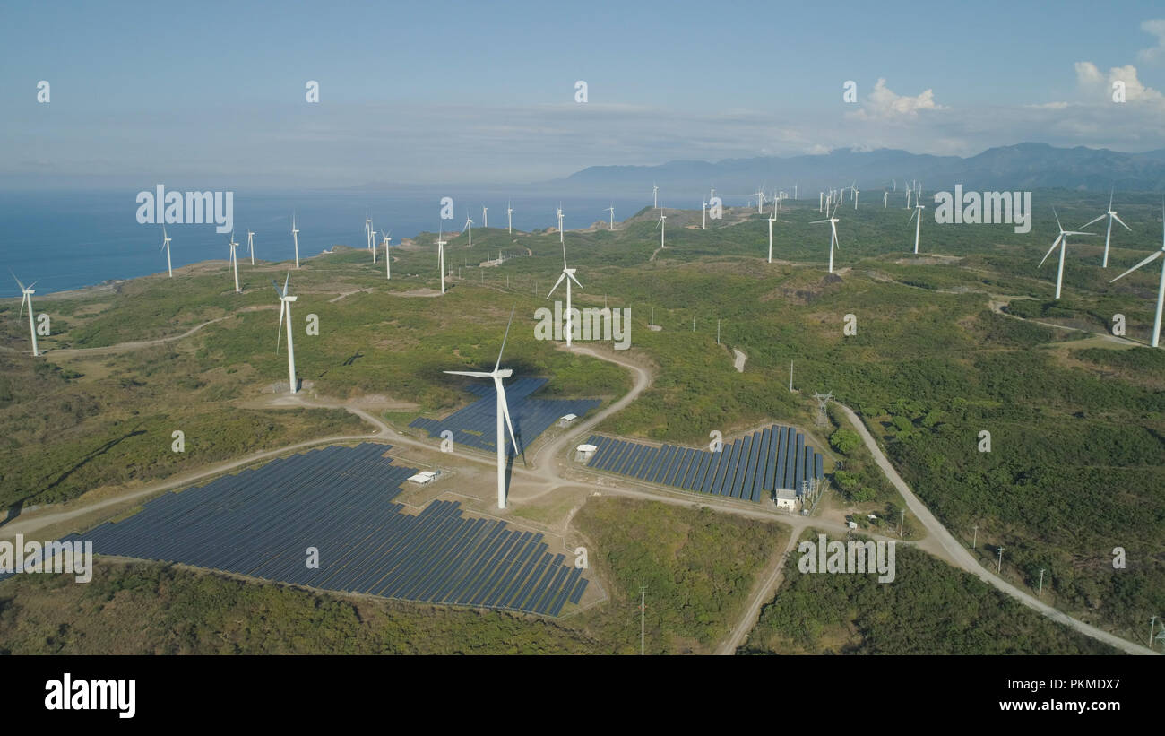 Aerial view of Windmills for electric power production on the seashore ...