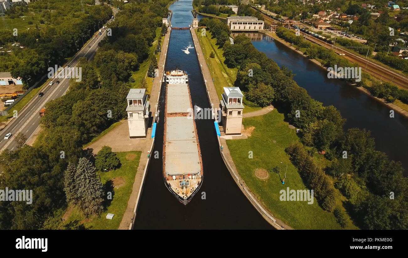 Sluice Gates on the River. Aerial view barge, ship in the river gateway ...
