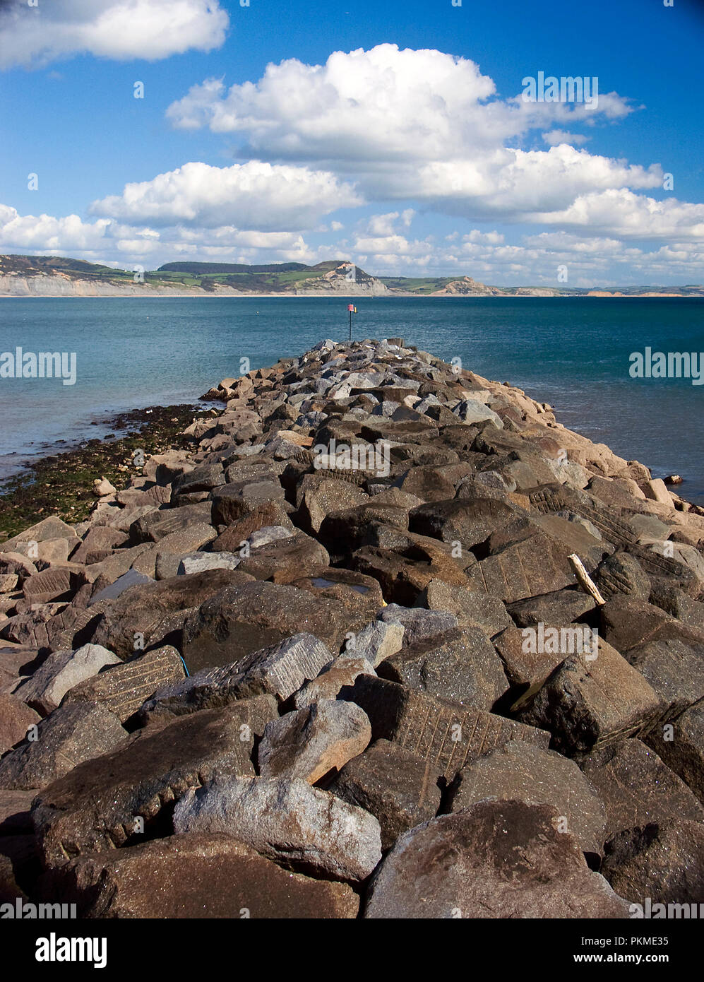 The breakwater at Lyme Regis in Dorset protecting the entrance to the ...