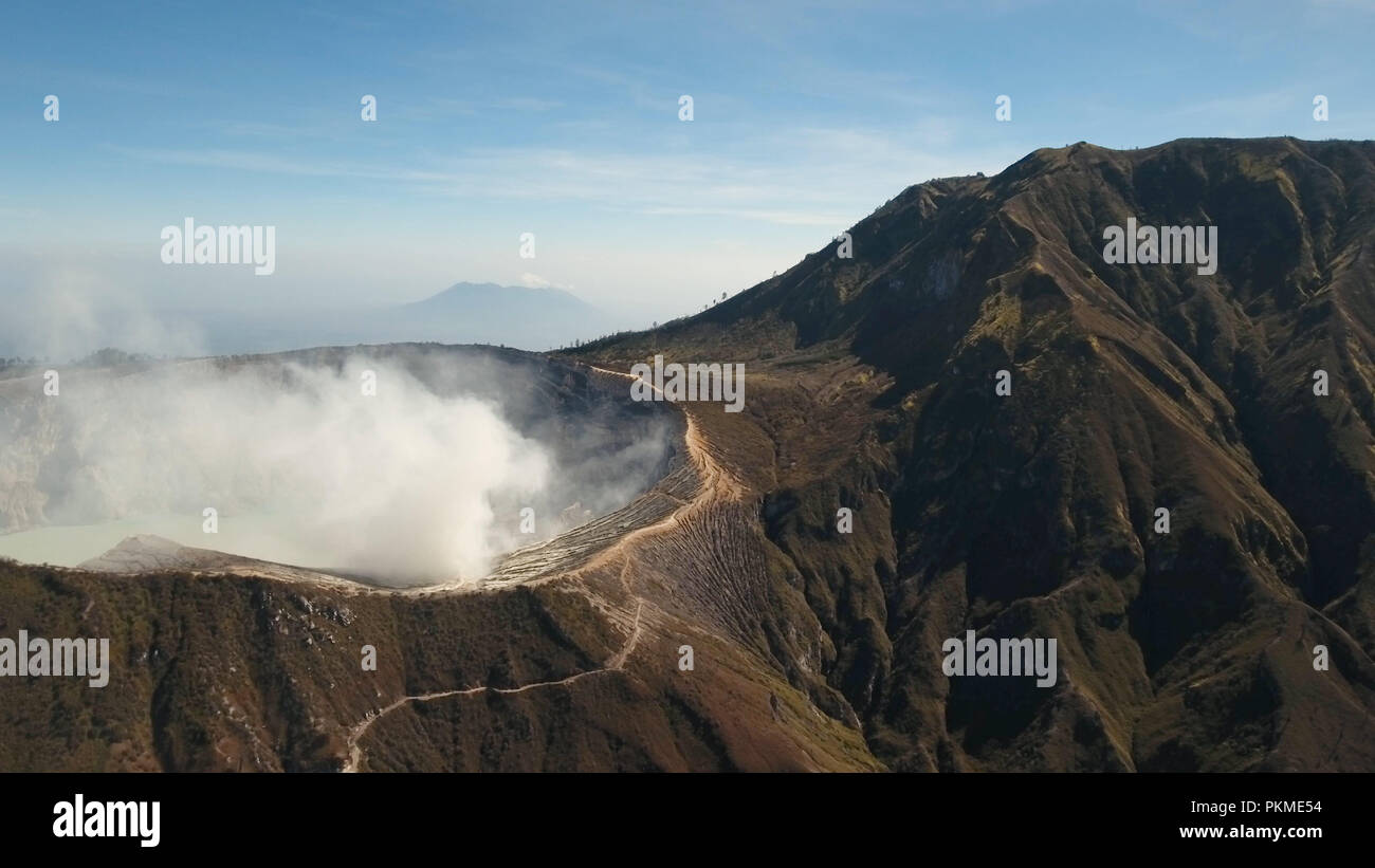 Crater with acidic crater lake, Kawah Ijen the famous tourist ...