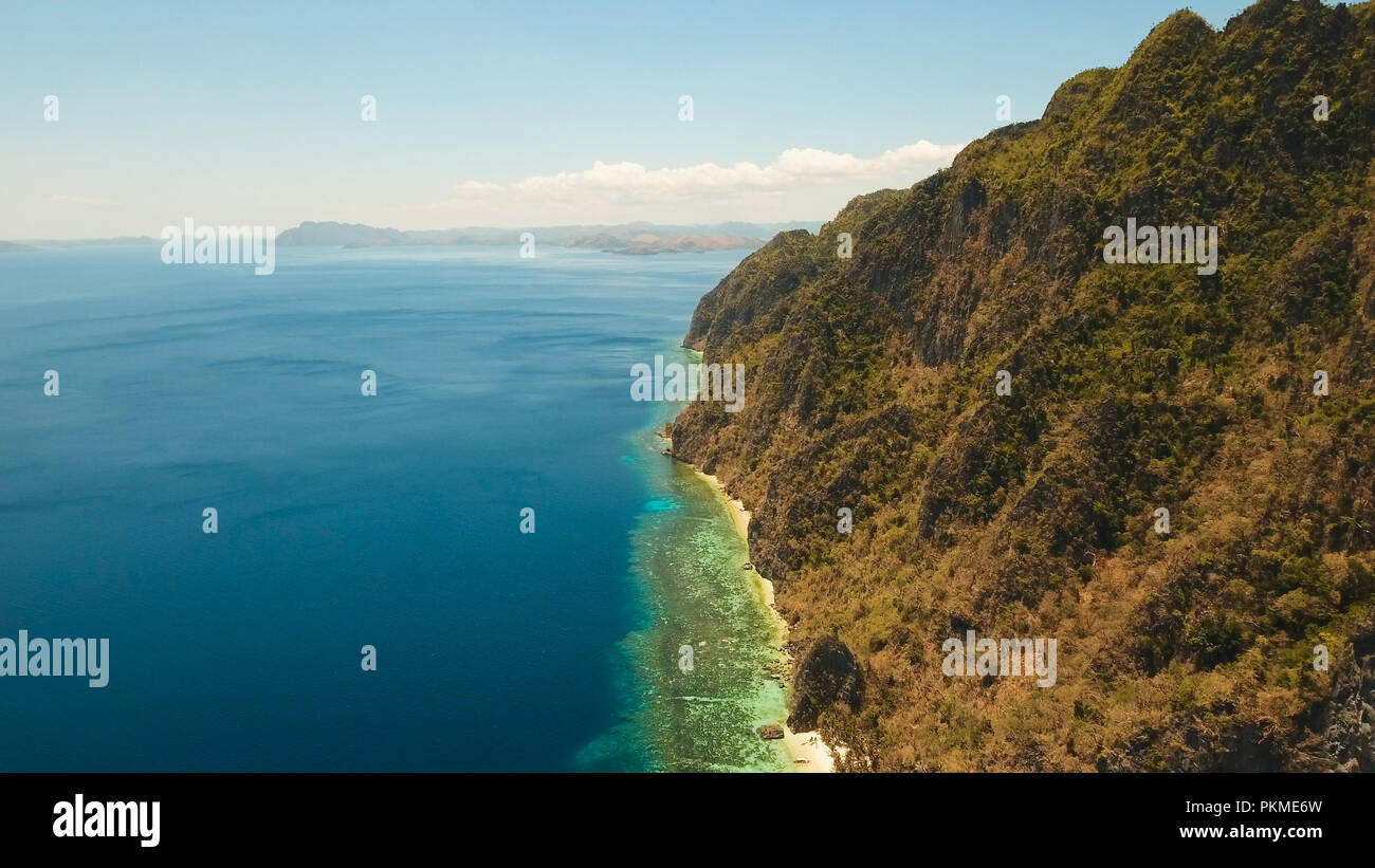 Aerial view: Lagoon with blue, azure water in the middle of small ...