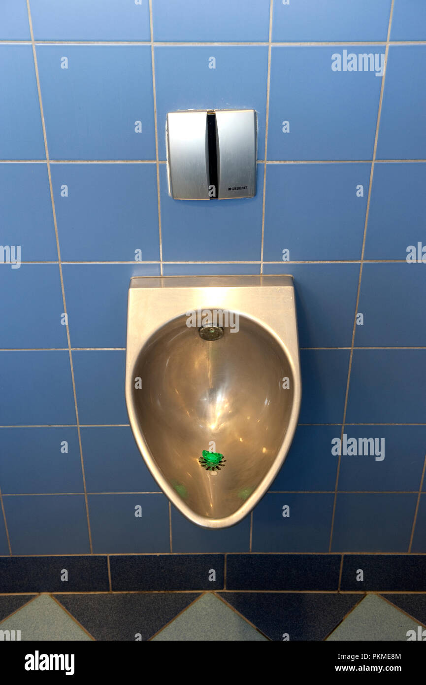 Men's urinal in a motorway service station toilet on the A2 Motorway in ...