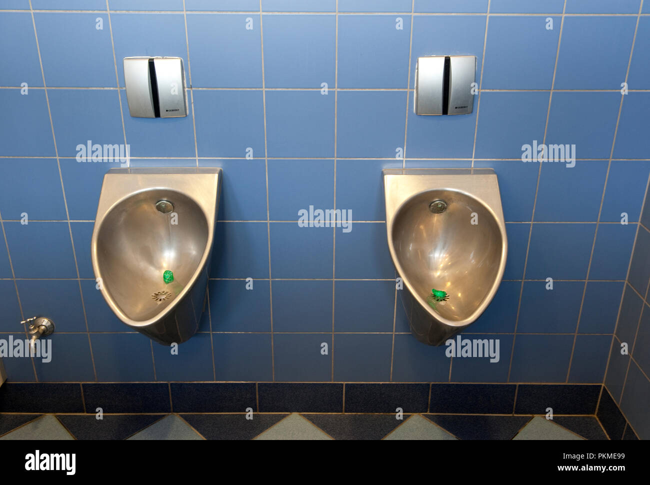 Men's urinal in a motorway service station toilet on the A2 Motorway in ...