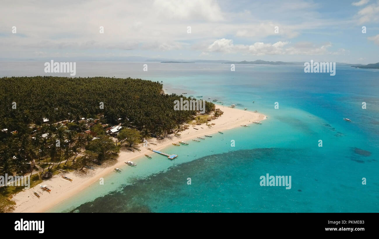 Aerial view of beautiful tropical island Daco with white sand beach ...