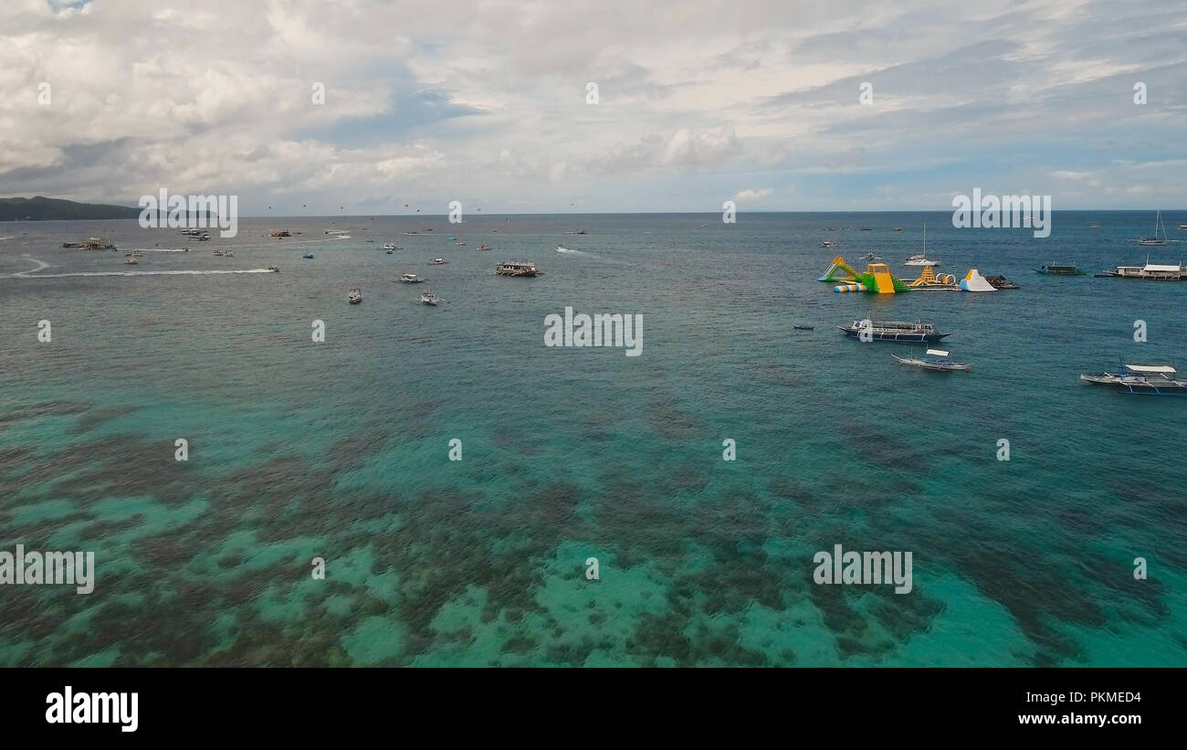 Summer sport, parasailing and boat, Boracay. Water sports and ...