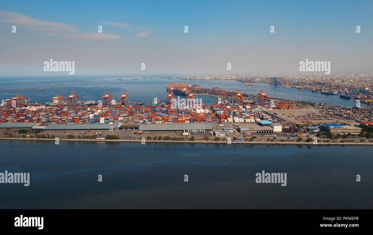 Aerial view industrial cargo port with ships and cranes, Manila. View ...