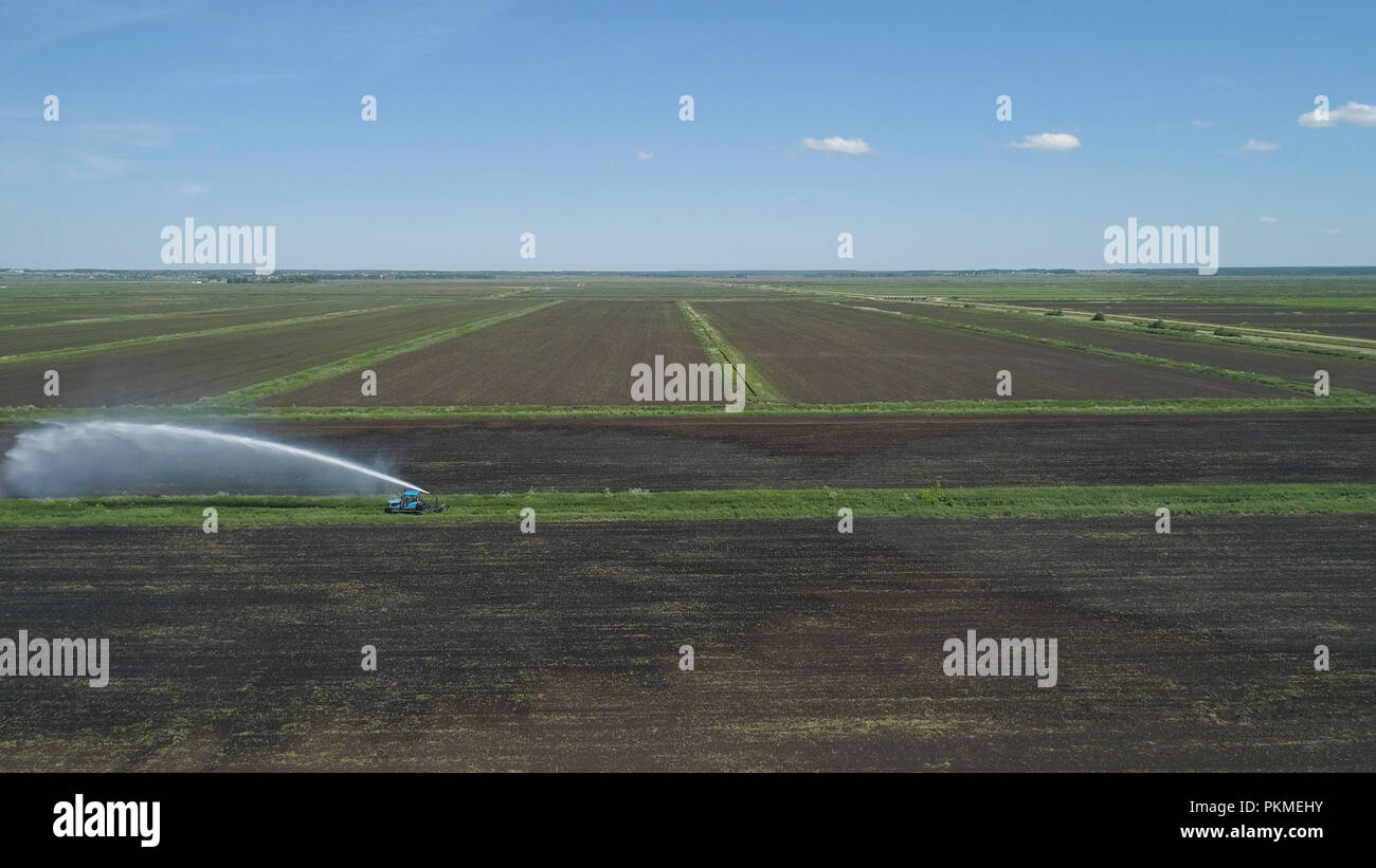 Aerial view of Crop Irrigation using the center pivot sprinkler system ...