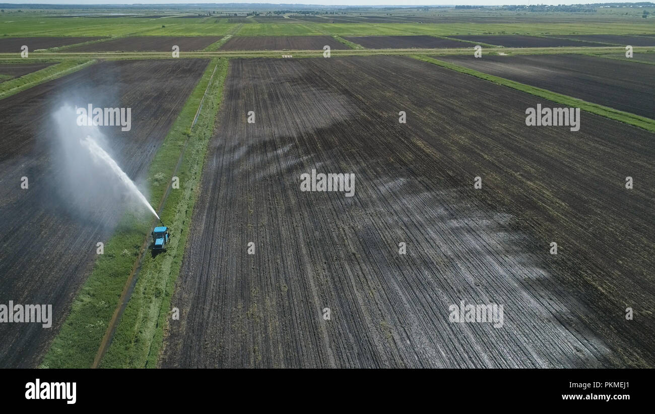 Aerial view of Crop Irrigation using the center pivot sprinkler system ...