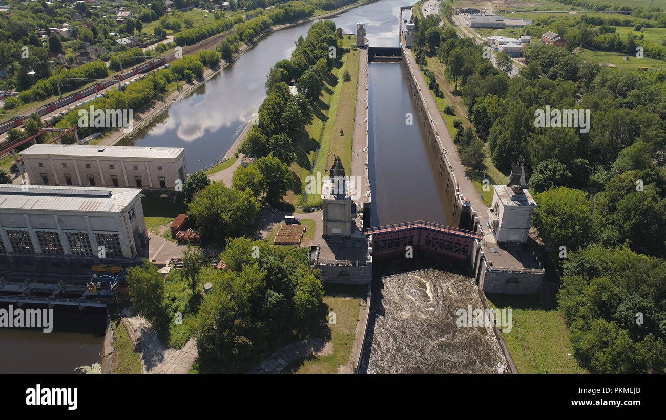 Sluice Gates on the River. Aerial view river sluice construction, water ...
