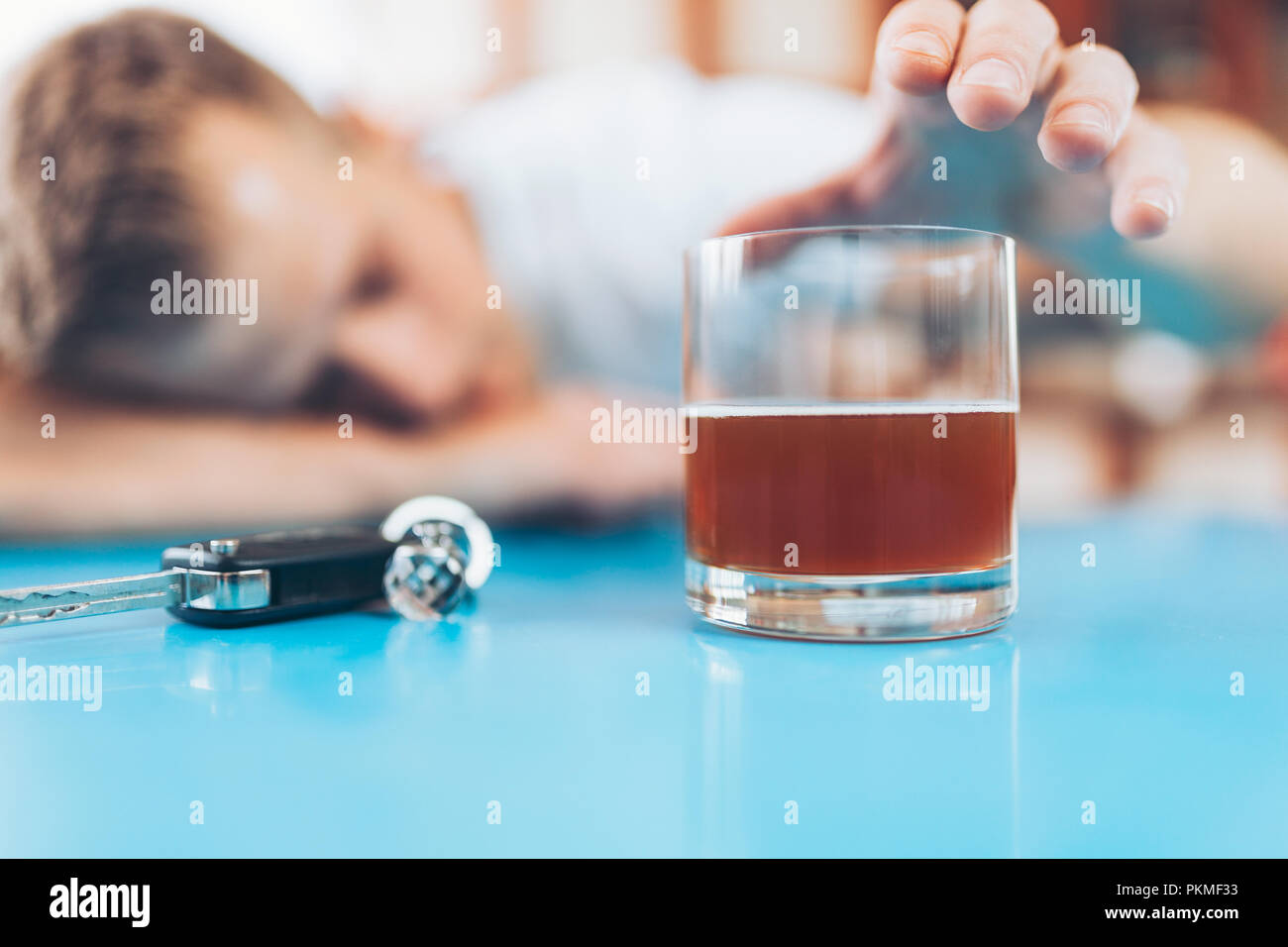 Drunk man at the bar intends to drive back home Stock Photo - Alamy