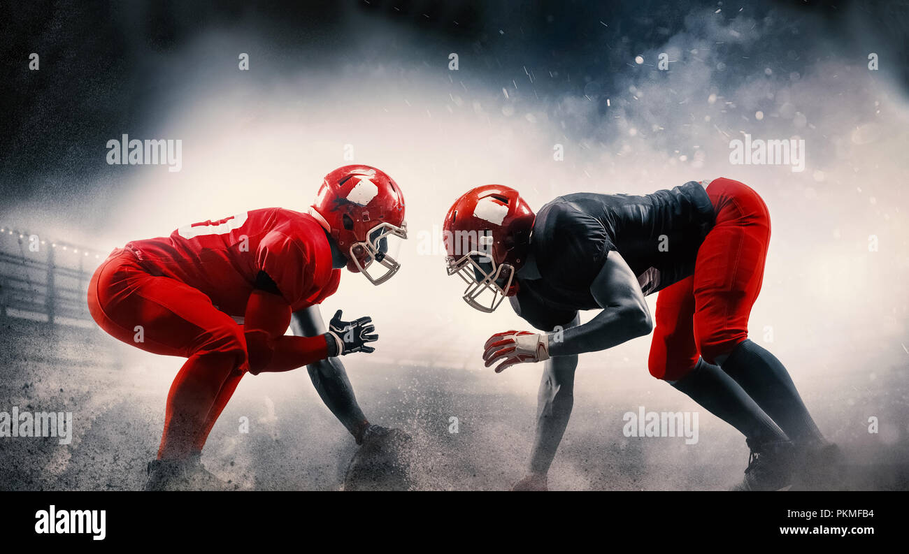 American football players in action play in professional sport stadium ...