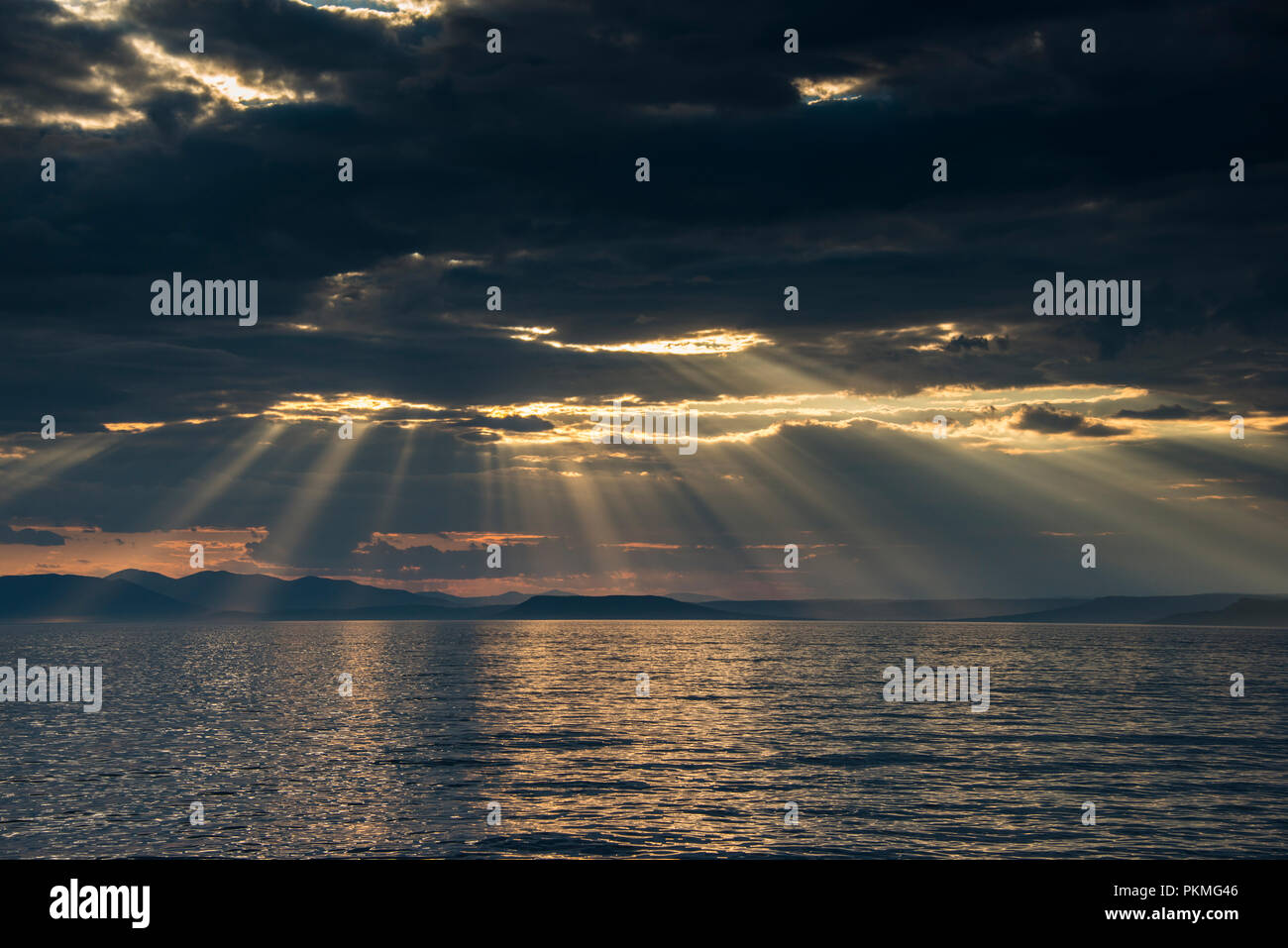 Sun breaking through the clouds above the Amur in Vladivostok, Russia ...