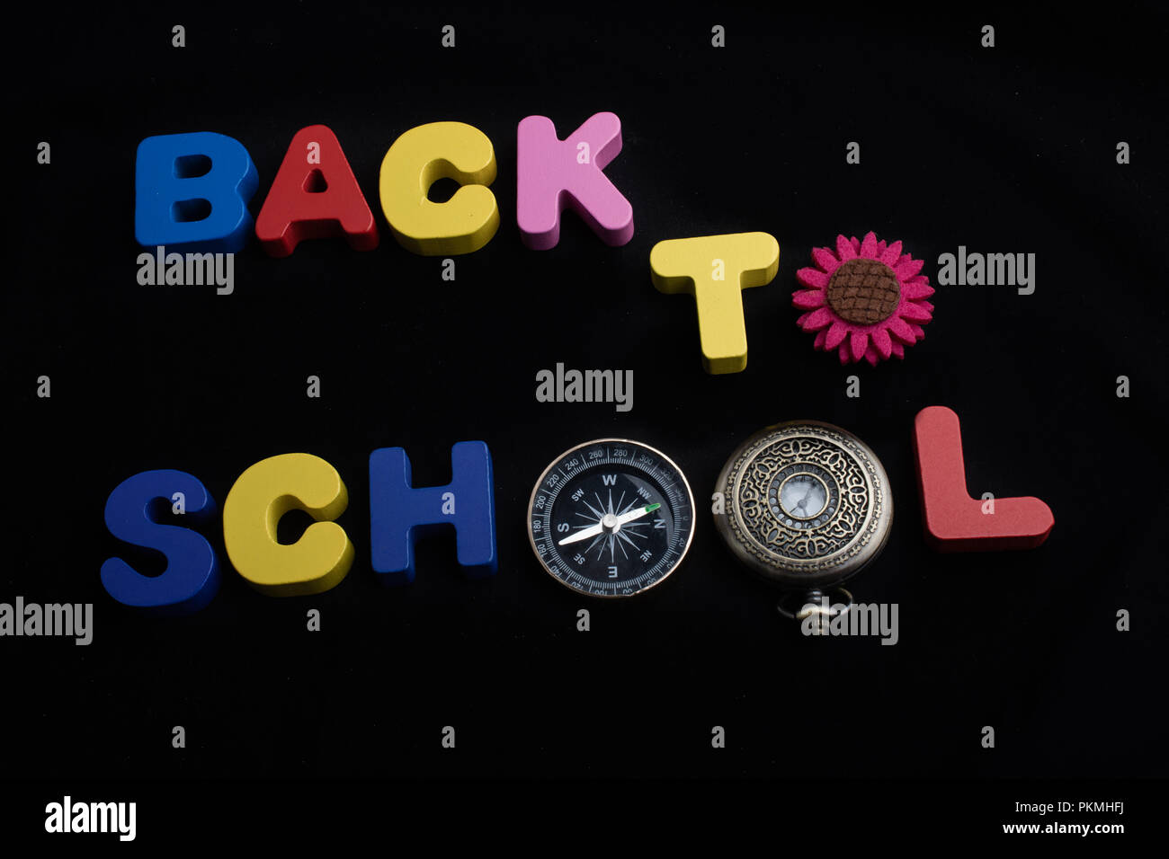 Education concept by School lettering with colorful wooden letters ...