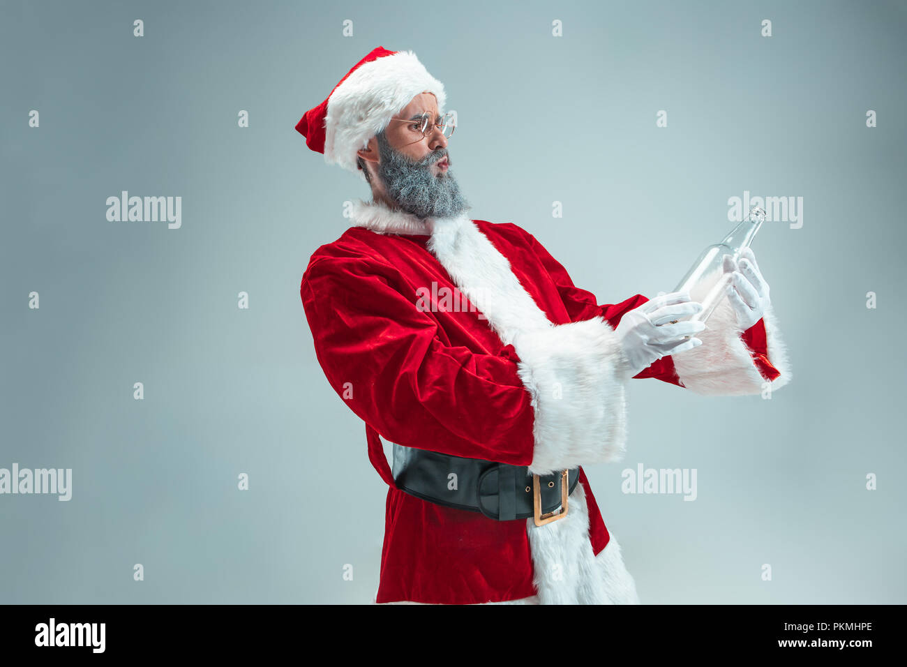 Wearing the red father christmas hat hi-res stock photography and ...