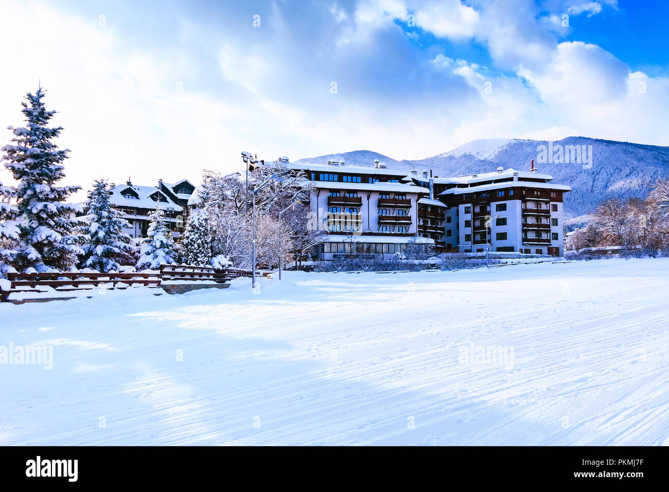 ski slope, houses and snow mountains landscape panorama in bulgarian ...