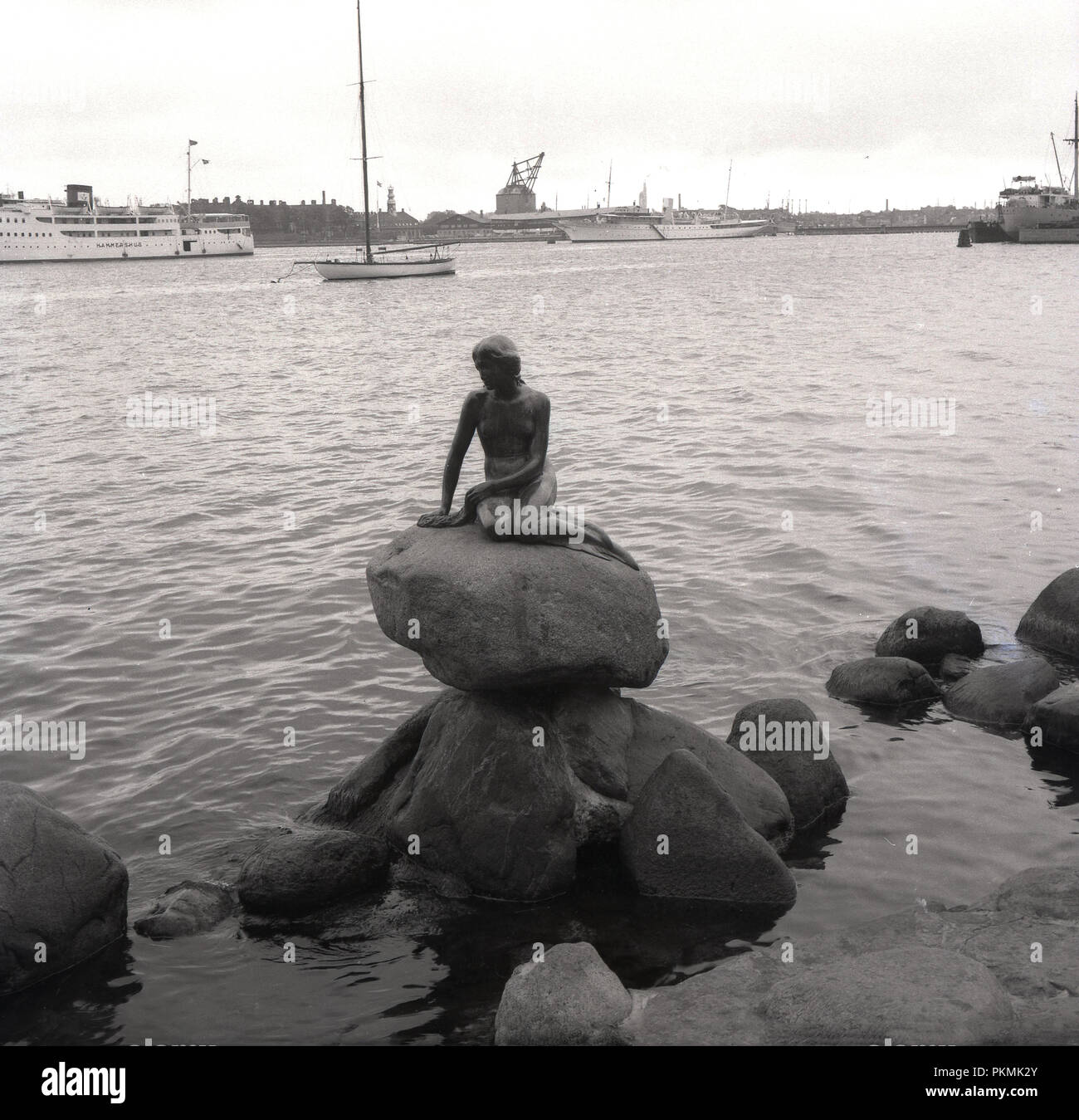 1950s, historical, the bronze sculpture by Edvard Eriksen,'The Little Mermiad' at the harbour at ...
