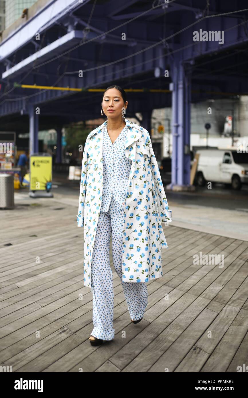 Blogger Aimee Song posing on the street outside of the Michael Kors ...