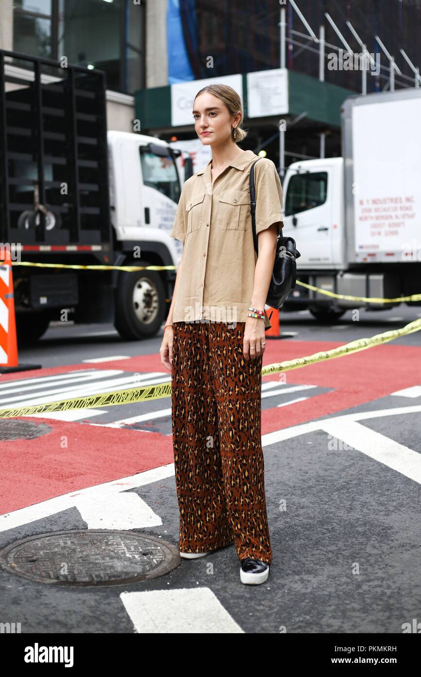 Hannah Baxter posing on the street outside of the Maryam Nassir show ...