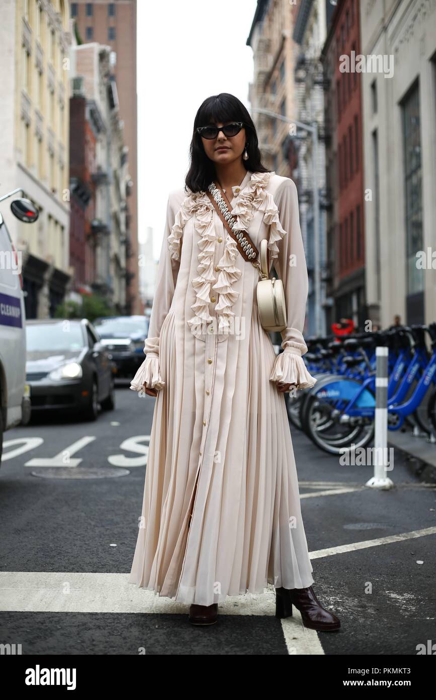 María Bernad posing on the street outside of the Maryam Nassir show ...
