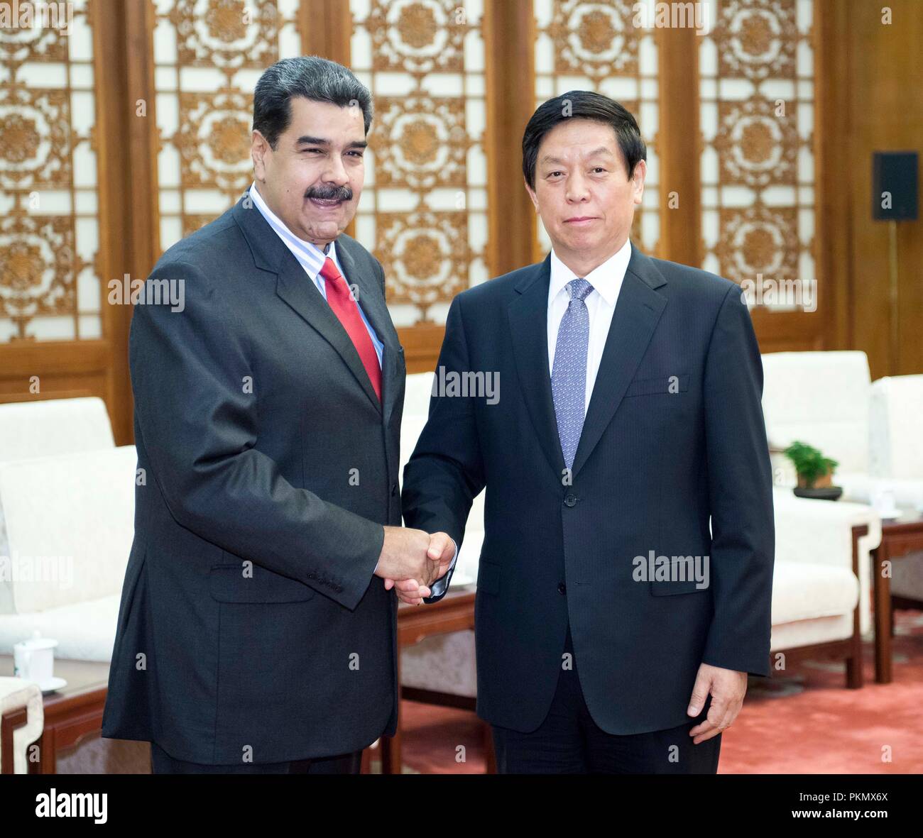 Beijing, China. 14th Sep, 2018. Li Zhanshu (R), chairman of the ...