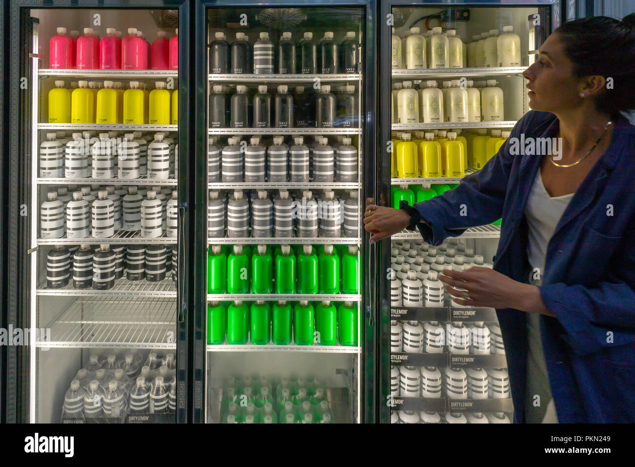 New York, USA. 14th September 2018. A worker checks the shelves in the ...