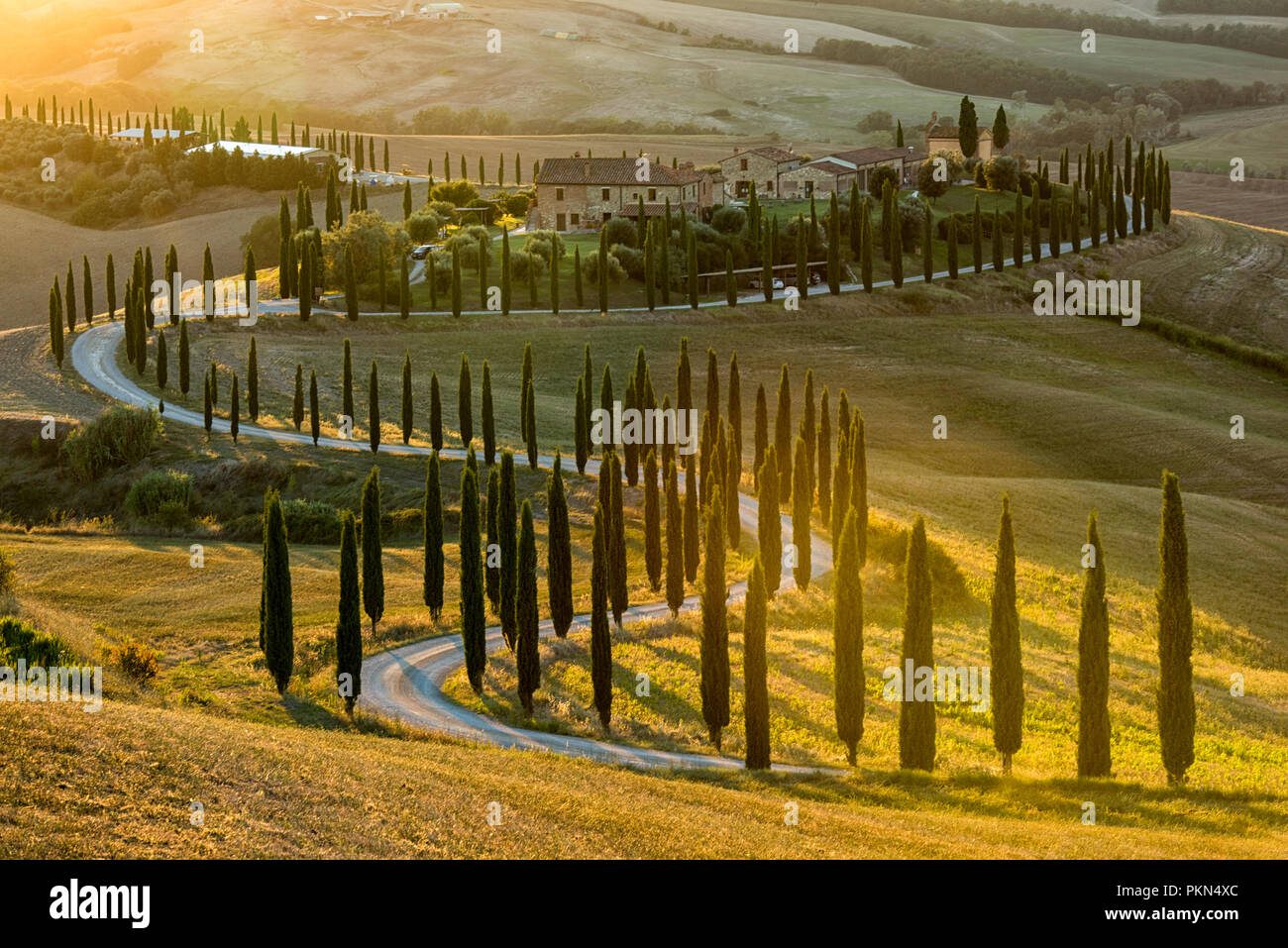 Sunset at the famous Agriturismo Baccoleno, near Asciano in Tuscany ...