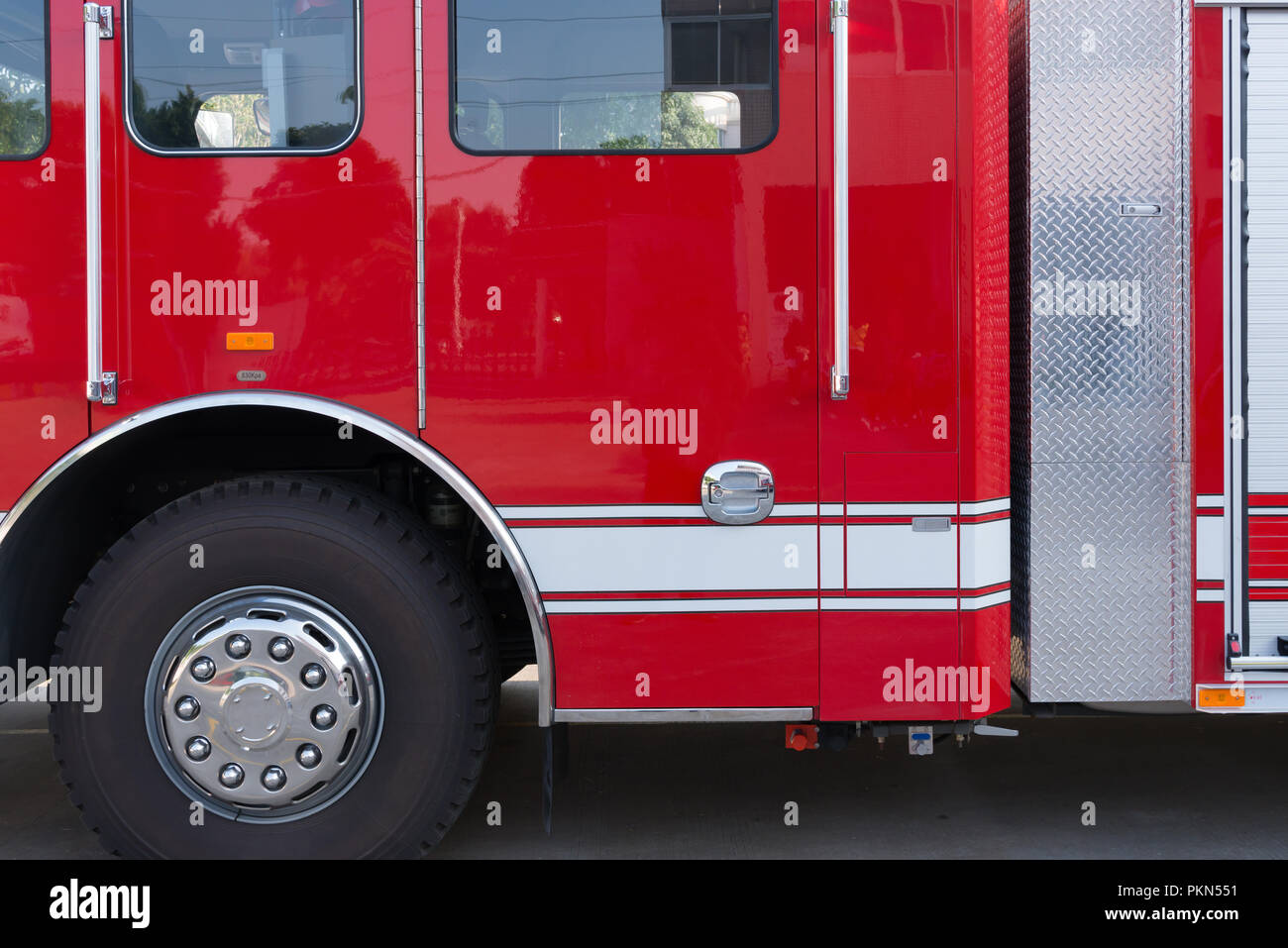 side of a fire truck as background Stock Photo - Alamy