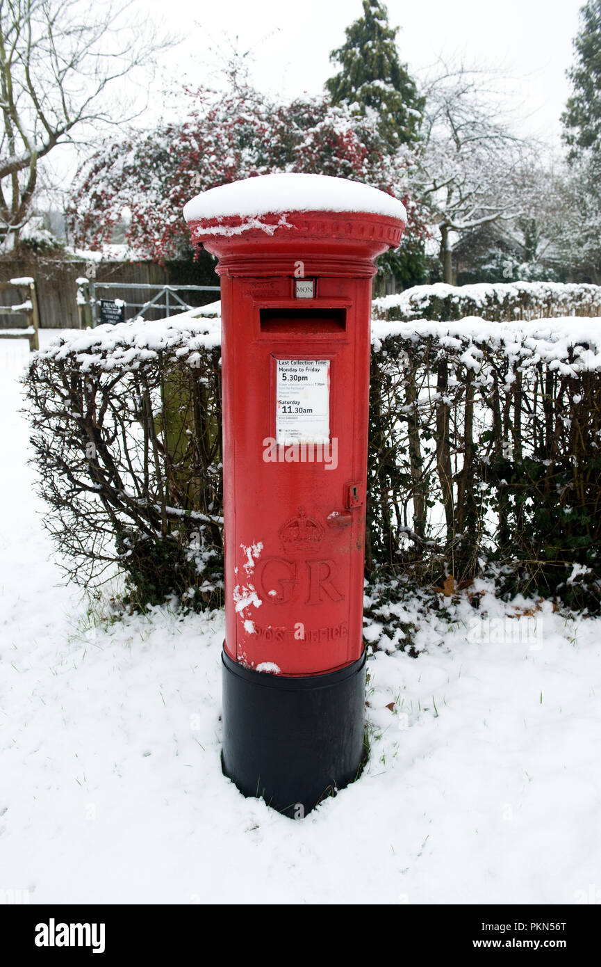 Royal Mail postbox covered in snow in Eton, Berkshire, England Stock ...