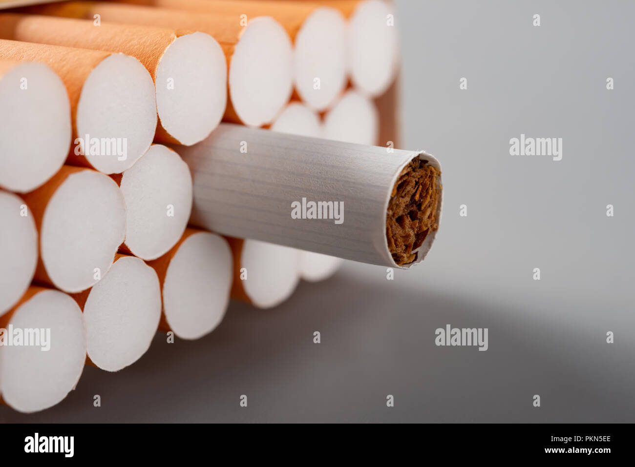 full box of cigarettes on grey background Stock Photo - Alamy
