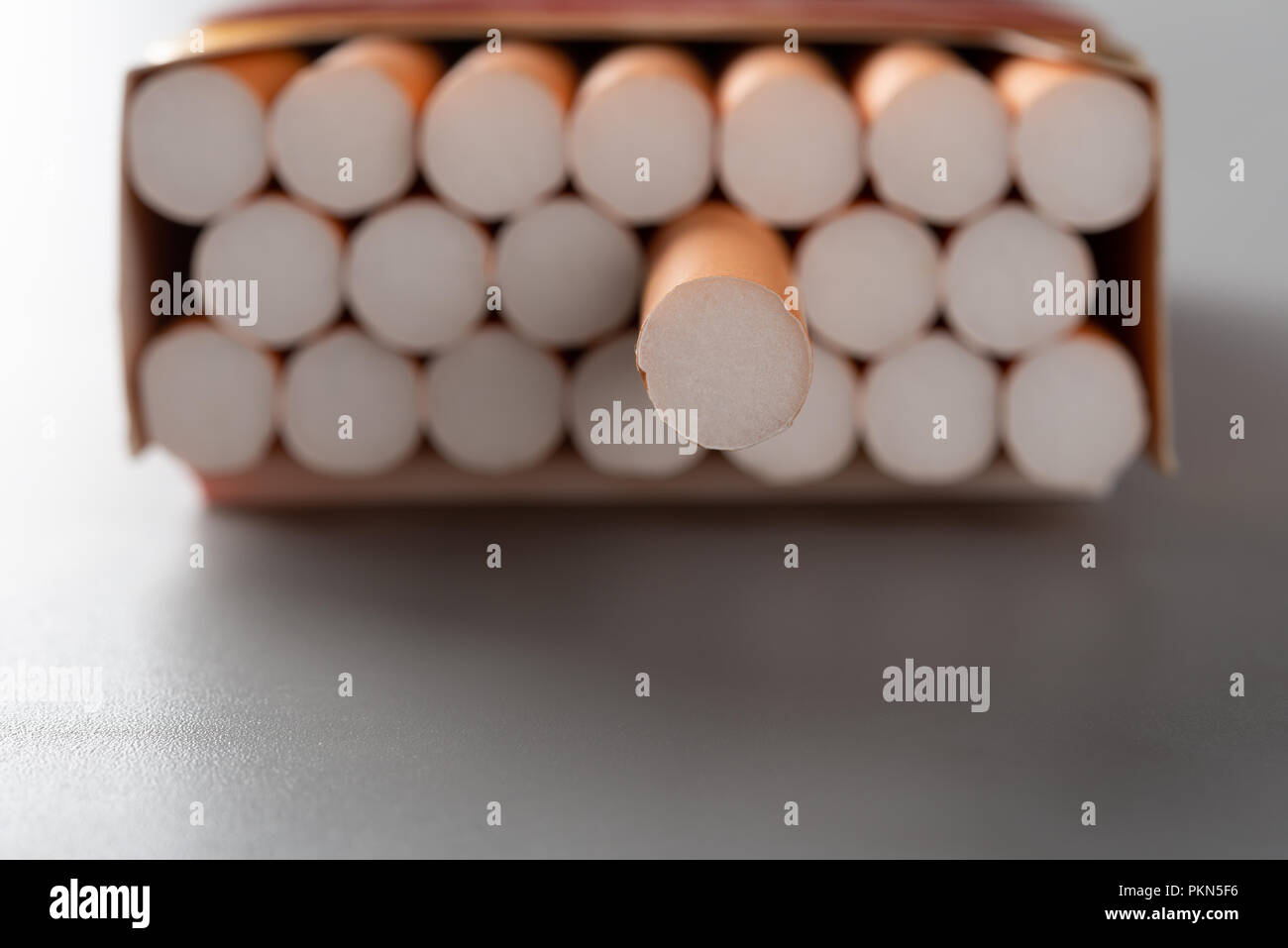 full box of cigarettes on grey background Stock Photo - Alamy
