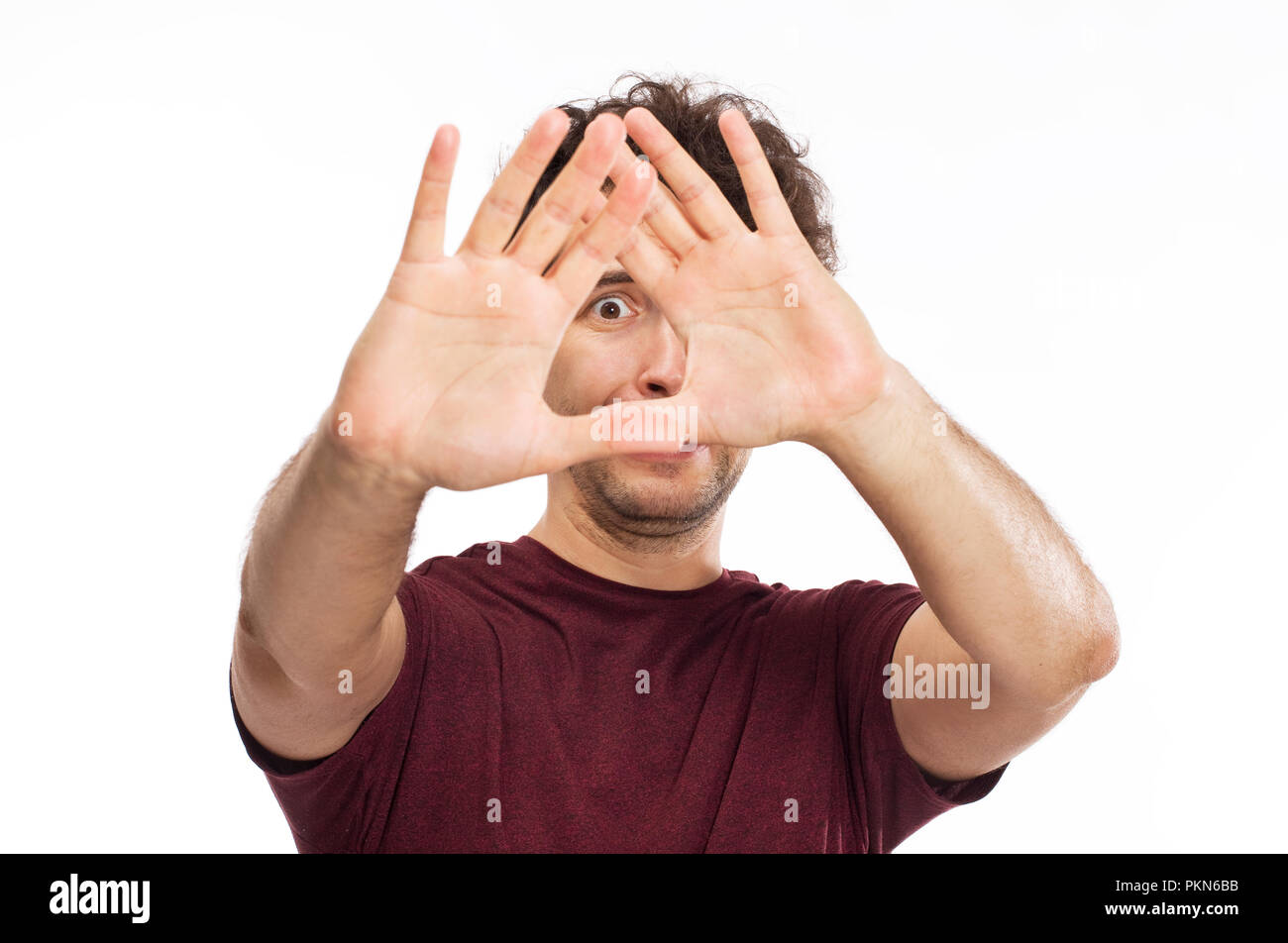 Male protecting face from violence attack Stock Photo - Alamy